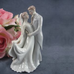 The First Kiss Cake Topper - JustCakeToppers.com